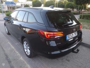 Black Opel Astra 2016 in Siauliai, with an engine capacity of 1.60 L and mileage of 212 thousand km for 5750 €, photo 4 on AUTOMOTO.COM.LV