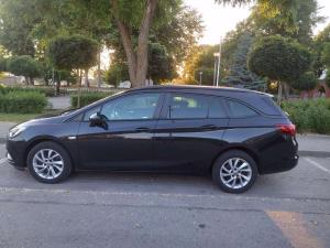 Black Opel Astra 2016 in Siauliai, with an engine capacity of 1.60 L and mileage of 212 thousand km for 5750 €, photo 6 on AUTOMOTO.COM.LV