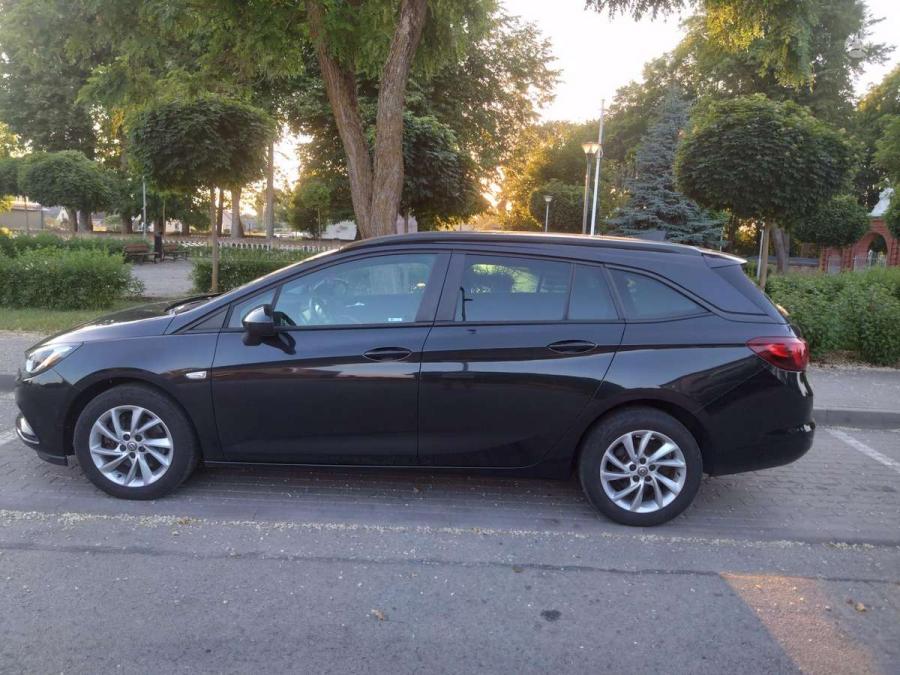 Black Opel Astra 2016 in Siauliai, with an engine capacity of 1.60 L and mileage of 212 thousand km for 5750 €, photo 6 on AUTOMOTO.COM.LV