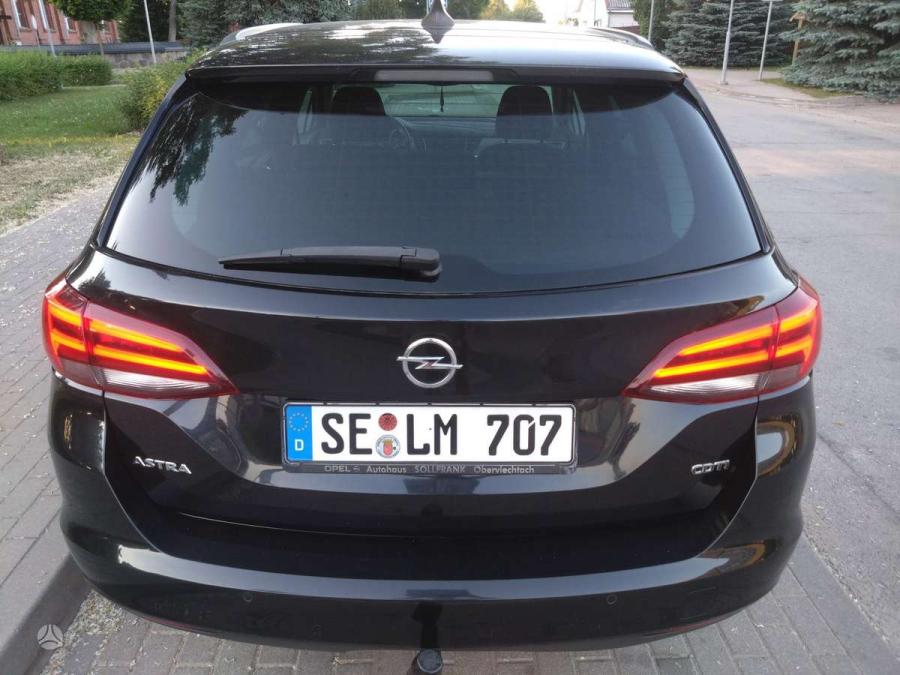 Black Opel Astra 2016 in Siauliai, with an engine capacity of 1.60 L and mileage of 212 thousand km for 5750 €, photo 9 on AUTOMOTO.COM.LV