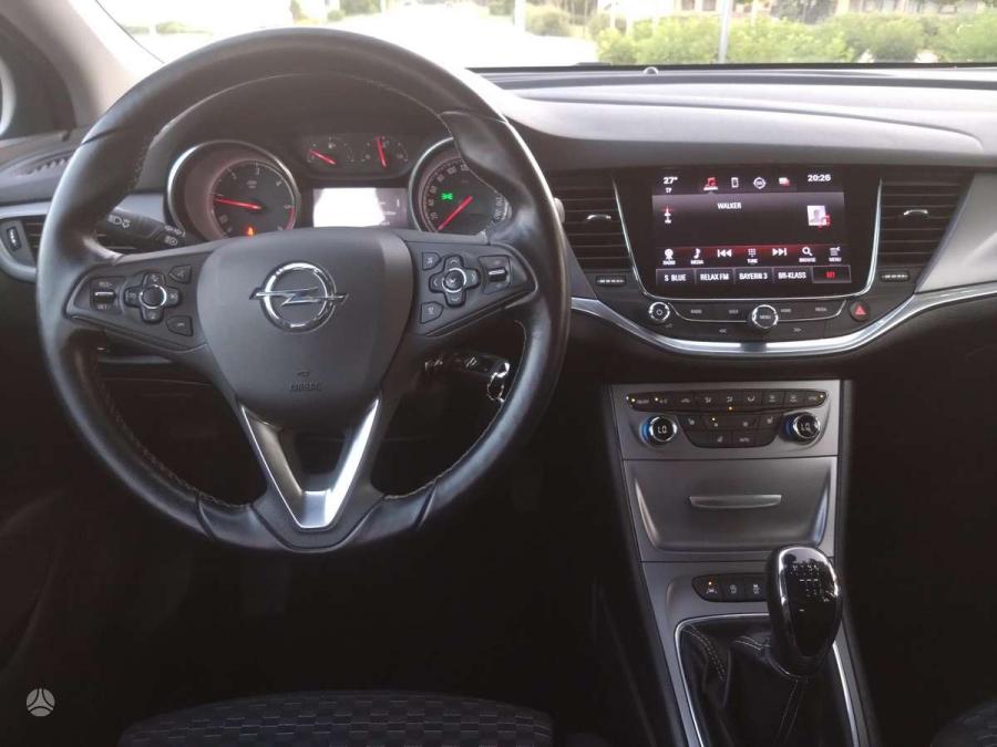 Black Opel Astra 2016 in Siauliai, with an engine capacity of 1.60 L and mileage of 212 thousand km for 5750 €, photo 10 on AUTOMOTO.COM.LV