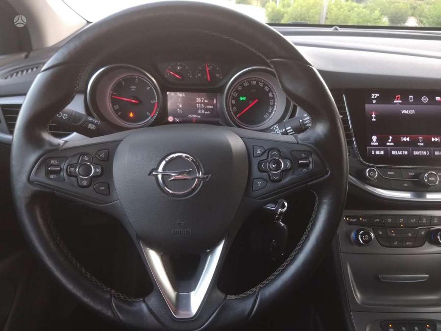 Black Opel Astra 2016 in Siauliai, with an engine capacity of 1.60 L and mileage of 212 thousand km for 5750 €, photo 11 on AUTOMOTO.COM.LV