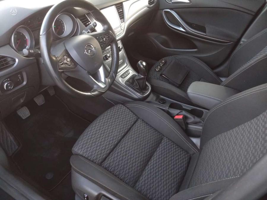 Black Opel Astra 2016 in Siauliai, with an engine capacity of 1.60 L and mileage of 212 thousand km for 5750 €, photo 13 on AUTOMOTO.COM.LV