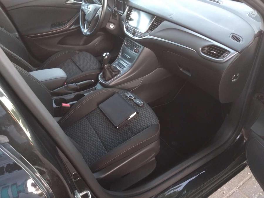 Black Opel Astra 2016 in Siauliai, with an engine capacity of 1.60 L and mileage of 212 thousand km for 5750 €, photo 14 on AUTOMOTO.COM.LV