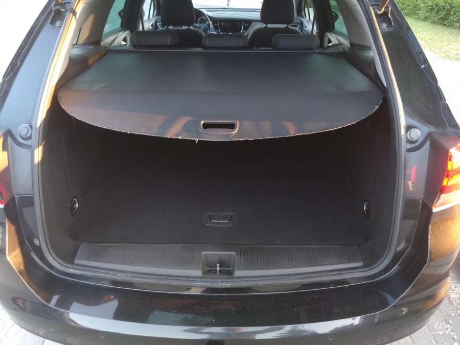 Black Opel Astra 2016 in Siauliai, with an engine capacity of 1.60 L and mileage of 212 thousand km for 5750 €, photo 18 on AUTOMOTO.COM.LV