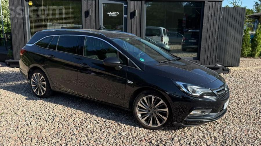 Black Opel Astra 2016 in Riga, with an engine capacity of 1.60 L and mileage of 199 thousand km for 8700 €, photo 3 on AUTOMOTO.COM.LV
