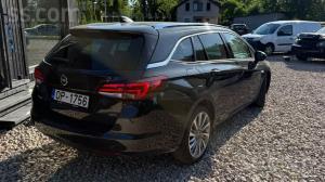 Black Opel Astra 2016 in Riga, with an engine capacity of 1.60 L and mileage of 199 thousand km for 8700 €, photo 4 on AUTOMOTO.COM.LV