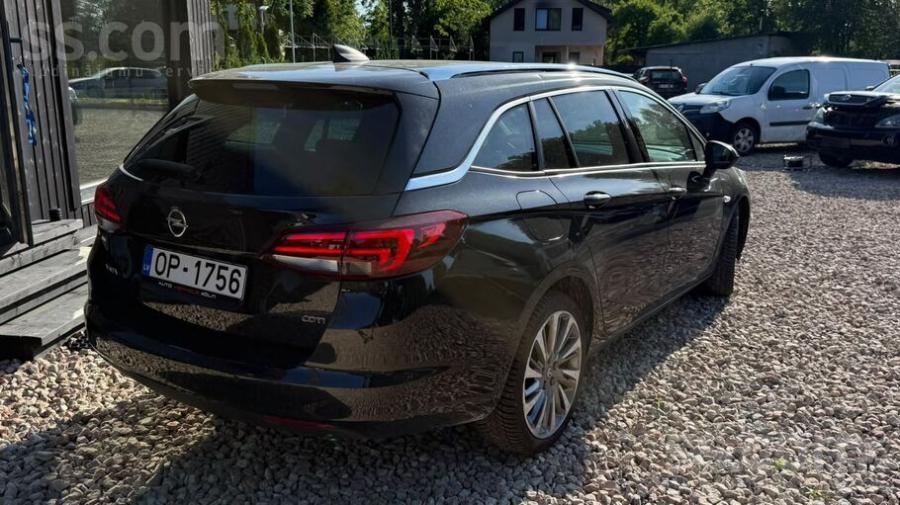 Black Opel Astra 2016 in Riga, with an engine capacity of 1.60 L and mileage of 199 thousand km for 8700 €, photo 4 on AUTOMOTO.COM.LV