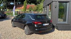 Black Opel Astra 2016 in Riga, with an engine capacity of 1.60 L and mileage of 199 thousand km for 8700 €, photo 6 on AUTOMOTO.COM.LV