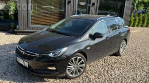 Black Opel Astra 2016 in Riga, with an engine capacity of 1.60 L and mileage of 199 thousand km for 8700 €, photo 8 on AUTOMOTO.COM.LV