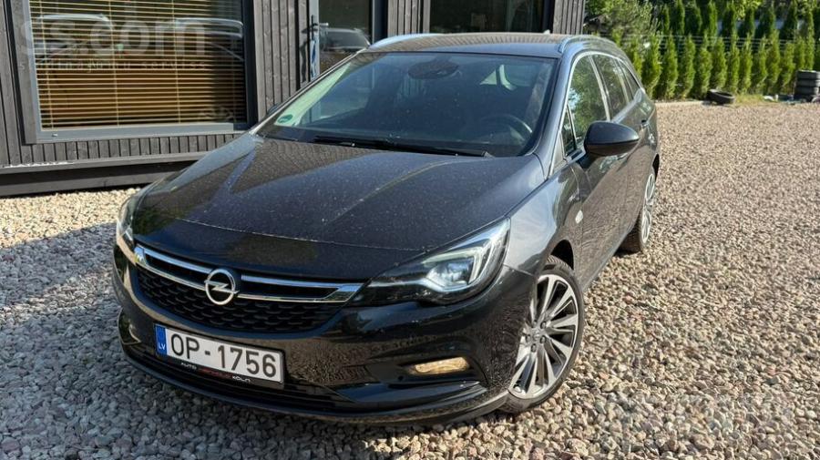 Black Opel Astra 2016 in Riga, with an engine capacity of 1.60 L and mileage of 199 thousand km for 8700 €, photo 9 on AUTOMOTO.COM.LV