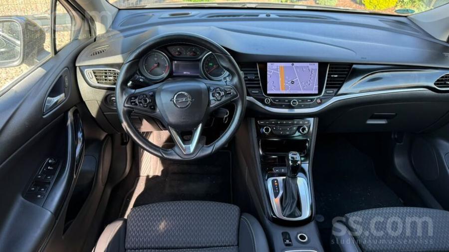 Black Opel Astra 2016 in Riga, with an engine capacity of 1.60 L and mileage of 199 thousand km for 8700 €, photo 13 on AUTOMOTO.COM.LV