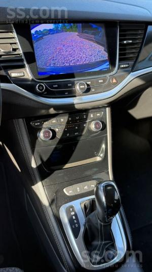 Black Opel Astra 2016 in Riga, with an engine capacity of 1.60 L and mileage of 199 thousand km for 8700 €, photo 20 on AUTOMOTO.COM.LV