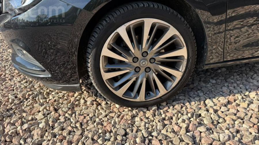 Black Opel Astra 2016 in Riga, with an engine capacity of 1.60 L and mileage of 199 thousand km for 8700 €, photo 23 on AUTOMOTO.COM.LV