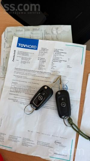 Black Opel Astra 2016 in Riga, with an engine capacity of 1.60 L and mileage of 199 thousand km for 8700 €, photo 26 on AUTOMOTO.COM.LV