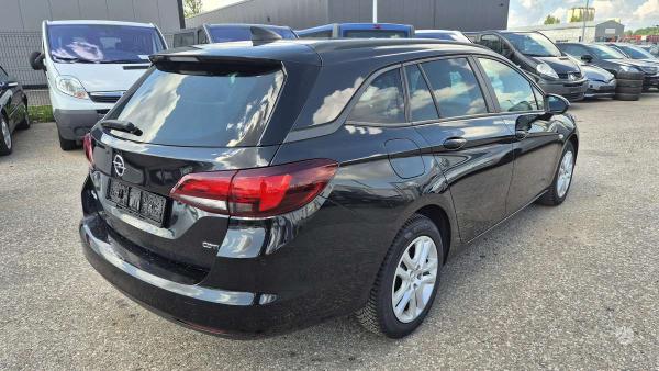 Black Opel Astra 2016 in Kaunas, with an engine capacity of 1.60 L and mileage of 245 thousand km for 4400 €, photo 4 on AUTOMOTO.COM.LV