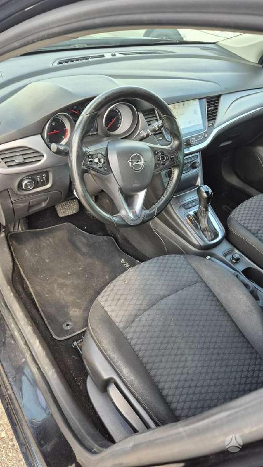 Black Opel Astra 2016 in Kaunas, with an engine capacity of 1.60 L and mileage of 245 thousand km for 4400 €, photo 6 on AUTOMOTO.COM.LV