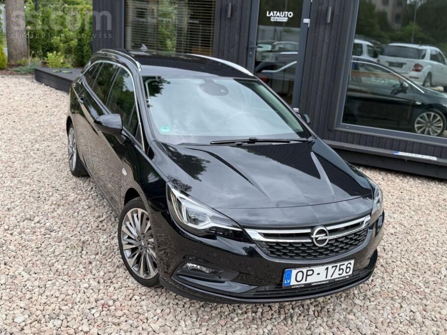 Black Opel Astra 2016 in Riga, with an engine capacity of 1.60 L and mileage of 199 thousand km for 8300 €, photo 1 on AUTOMOTO.COM.LV