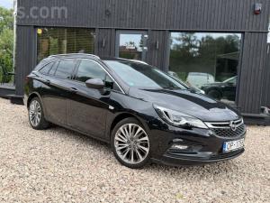 Black Opel Astra 2016 in Riga, with an engine capacity of 1.60 L and mileage of 199 thousand km for 8300 €, photo 3 on AUTOMOTO.COM.LV