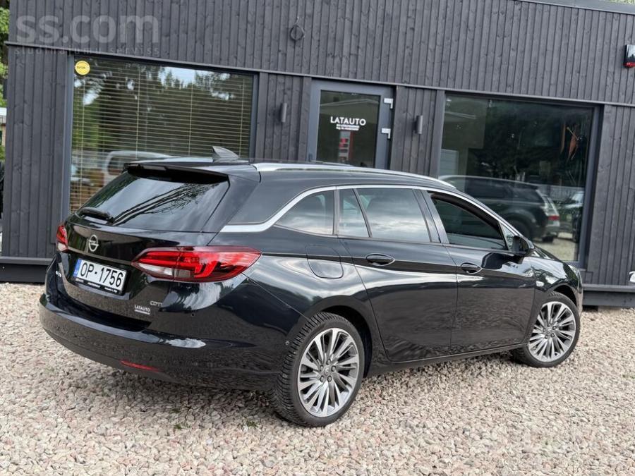 Black Opel Astra 2016 in Riga, with an engine capacity of 1.60 L and mileage of 199 thousand km for 8300 €, photo 6 on AUTOMOTO.COM.LV