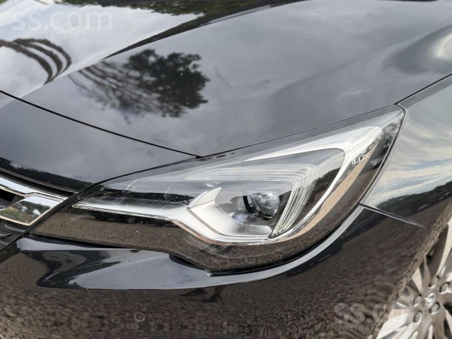 Black Opel Astra 2016 in Riga, with an engine capacity of 1.60 L and mileage of 199 thousand km for 8300 €, photo 13 on AUTOMOTO.COM.LV