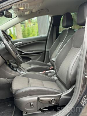 Black Opel Astra 2016 in Riga, with an engine capacity of 1.60 L and mileage of 199 thousand km for 8300 €, photo 18 on AUTOMOTO.COM.LV