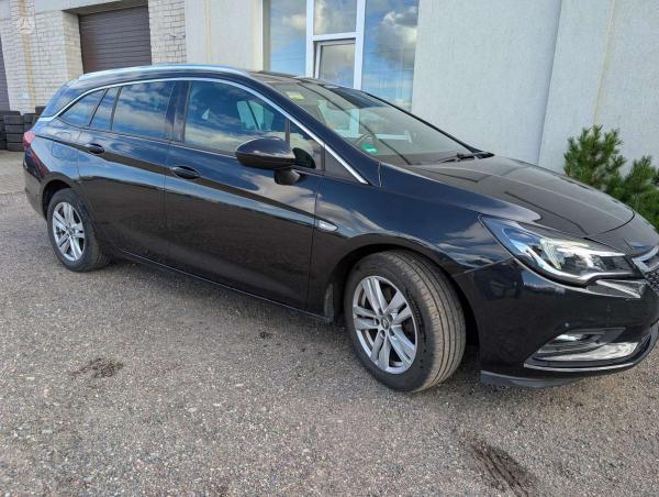 Black Opel Astra 2016 in Marijampole, with an engine capacity of 1.60 L and mileage of 131 thousand km for 5200 €, photo 4 on AUTOMOTO.COM.LV