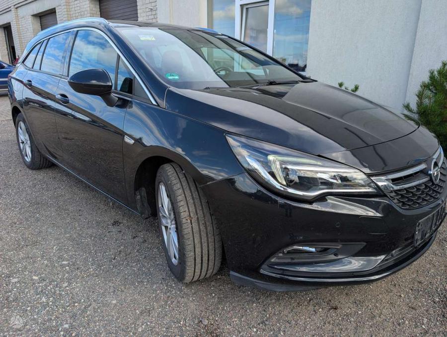 Black Opel Astra 2016 in Marijampole, with an engine capacity of 1.60 L and mileage of 131 thousand km for 5200 €, photo 6 on AUTOMOTO.COM.LV