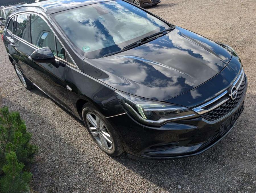Black Opel Astra 2016 in Marijampole, with an engine capacity of 1.60 L and mileage of 131 thousand km for 5200 €, photo 18 on AUTOMOTO.COM.LV