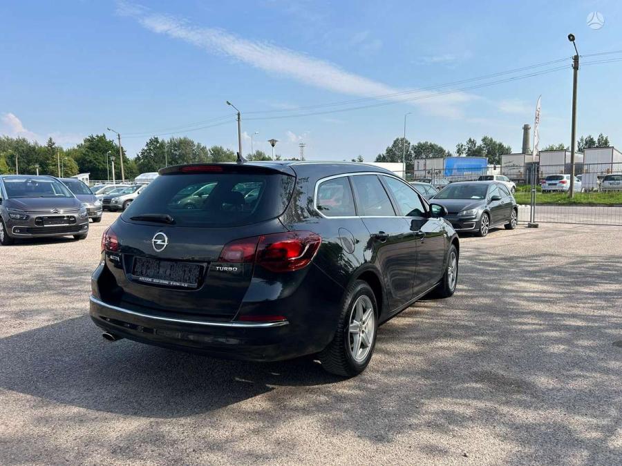Black Opel Astra 2016 in Marijampole, with an engine capacity of 1.36 L and mileage of 168 thousand km for 5900 €, photo 10 on AUTOMOTO.COM.LV