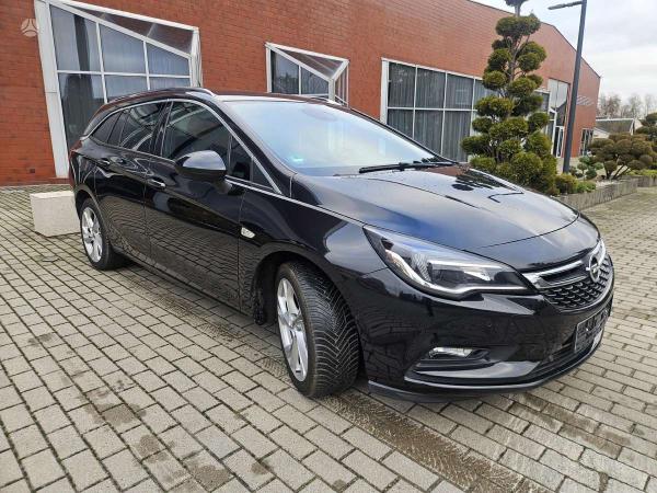 Black Opel Astra 2017 in Marijampole, with an engine capacity of 1.40 L and mileage of 144 thousand km for 7800 €, photo 2 on AUTOMOTO.COM.LV