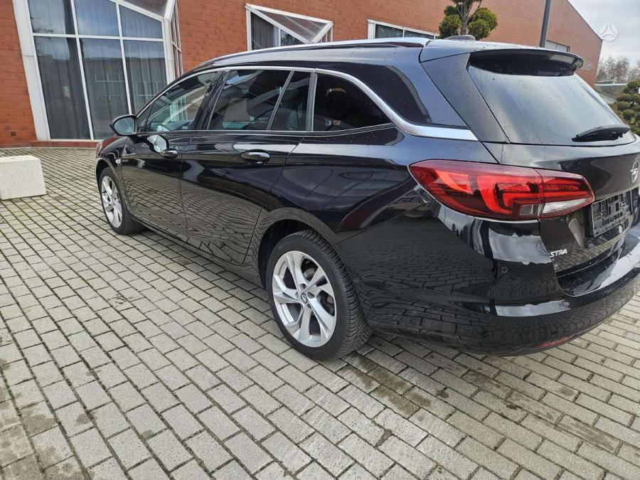 Black Opel Astra 2017 in Marijampole, with an engine capacity of 1.40 L and mileage of 144 thousand km for 7800 €, photo 3 on AUTOMOTO.COM.LV