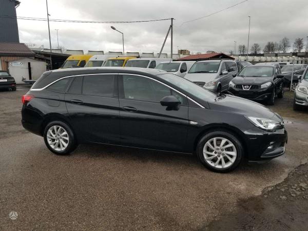 Black Opel Astra 2017 in Kaunas, with an engine capacity of 1.60 L and mileage of 250 thousand km for 6550 €, photo 5 on AUTOMOTO.COM.LV