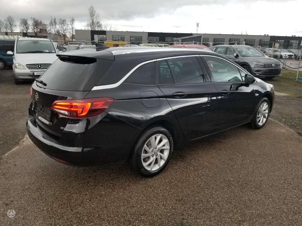 Black Opel Astra 2017 in Kaunas, with an engine capacity of 1.60 L and mileage of 250 thousand km for 6550 €, photo 6 on AUTOMOTO.COM.LV