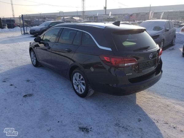 Black Opel Astra 2017 in Kaunas, with an engine capacity of 1.60 L and mileage of 250 thousand km for 6250 €, photo 7 on AUTOMOTO.COM.LV
