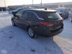 Black Opel Astra 2017 in Kaunas, with an engine capacity of 1.60 L and mileage of 250 thousand km for 6250 €, photo 7 on AUTOMOTO.COM.LV