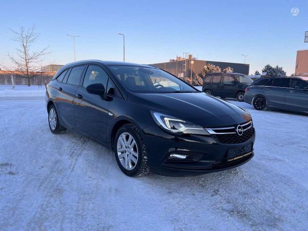 Black Opel Astra 2017 in Siauliai, with an engine capacity of 1.60 L and mileage of 245 thousand km for 6900 €, photo 1 on AUTOMOTO.COM.LV