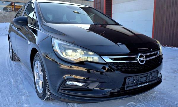Black Opel Astra 2017 in Kretinga, with an engine capacity of 1.60 L and mileage of 141 thousand km for 6150 €, photo 1 on AUTOMOTO.COM.LV