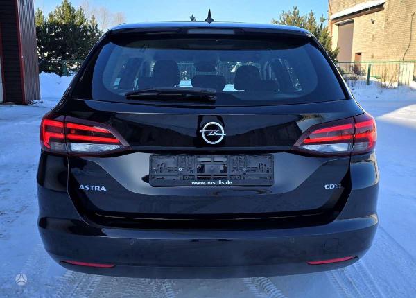 Black Opel Astra 2017 in Kretinga, with an engine capacity of 1.60 L and mileage of 141 thousand km for 6150 €, photo 11 on AUTOMOTO.COM.LV