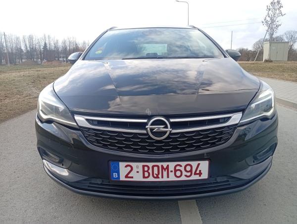 Black Opel Astra 2017 in Vilnius, with an engine capacity of 1.60 L and mileage of 231 thousand km for 5250 €, photo 2 on AUTOMOTO.COM.LV