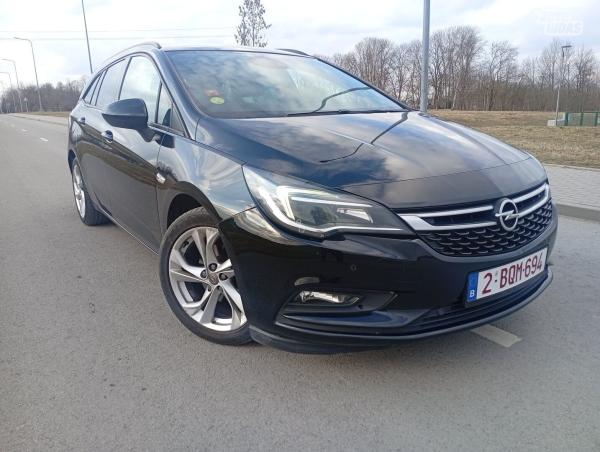 Black Opel Astra 2017 in Vilnius, with an engine capacity of 1.60 L and mileage of 231 thousand km for 5250 €, photo 3 on AUTOMOTO.COM.LV