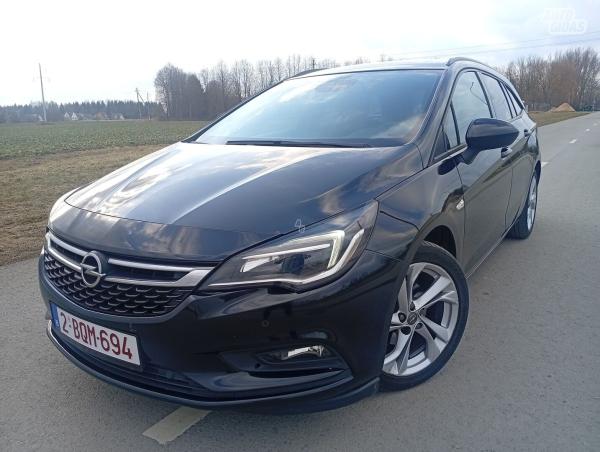 Black Opel Astra 2017 in Vilnius, with an engine capacity of 1.60 L and mileage of 231 thousand km for 5250 €, photo 1 on AUTOMOTO.COM.LV