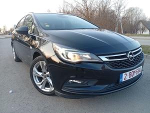 Black Opel Astra 2017 in Vilnius, with an engine capacity of 1.60 L and mileage of 231 thousand km for 5300 €, photo 3 on AUTOMOTO.COM.LV