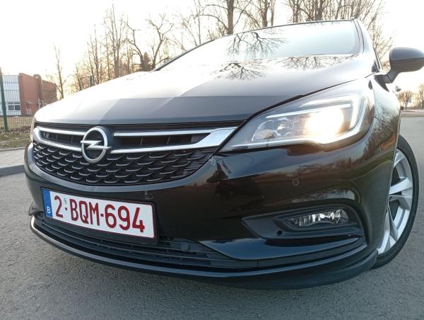Black Opel Astra 2017 in Vilnius, with an engine capacity of 1.60 L and mileage of 231 thousand km for 5300 €, photo 7 on AUTOMOTO.COM.LV