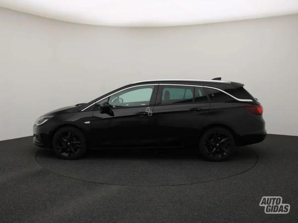 Black Opel Astra 2017 in Vilnius, with an engine capacity of 1.60 L and mileage of 207 thousand km for 7799 €, photo 6 on AUTOMOTO.COM.LV