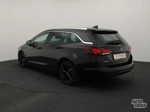 Black Opel Astra 2017 in Vilnius, with an engine capacity of 1.60 L and mileage of 207 thousand km for 7799 €, photo 7 on AUTOMOTO.COM.LV