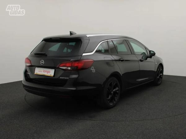 Black Opel Astra 2017 in Vilnius, with an engine capacity of 1.60 L and mileage of 207 thousand km for 7799 €, photo 8 on AUTOMOTO.COM.LV