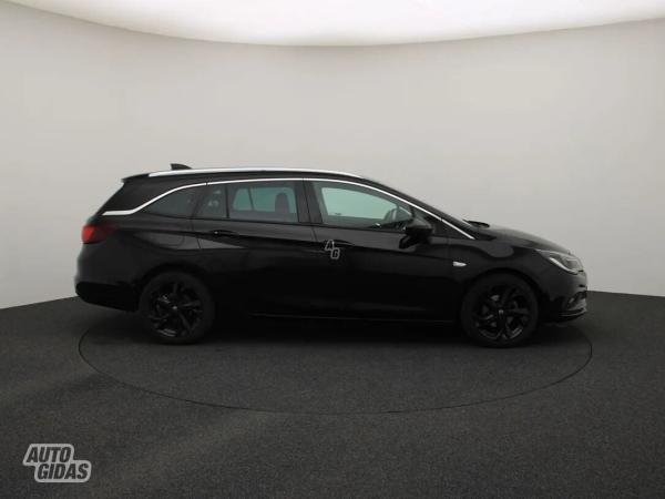 Black Opel Astra 2017 in Vilnius, with an engine capacity of 1.60 L and mileage of 207 thousand km for 7799 €, photo 9 on AUTOMOTO.COM.LV