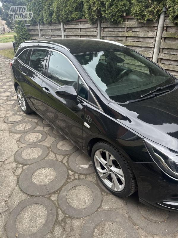 Black Opel Astra 2017 in Panevezys, with an engine capacity of 1.60 L and mileage of 177 thousand km for 5500 €, photo 3 on AUTOMOTO.COM.LV