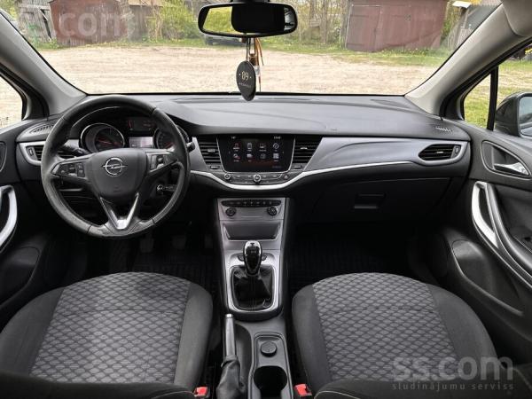 Black Opel Astra 2017 in Liepaja, with an engine capacity of 1.60 L and mileage of 192 thousand km for 6500 €, photo 8 on AUTOMOTO.COM.LV